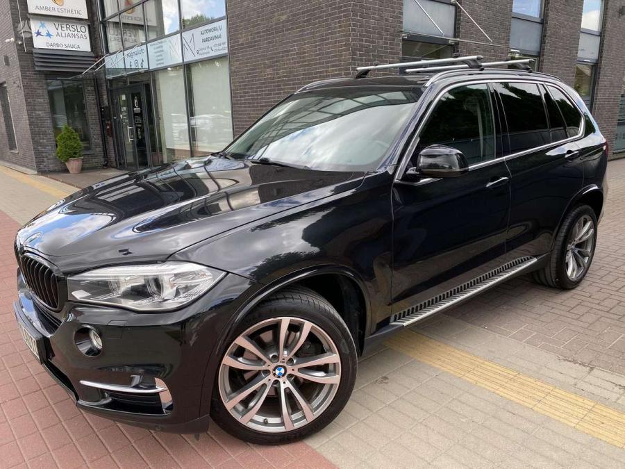 Black BMW X5 2014 in Marijampole, with an engine capacity of 2.99 L and mileage of 215 thousand km for 16850 €, photo 7 on AUTOMOTO.COM.LV
