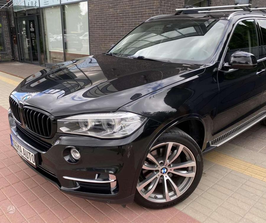 Black BMW X5 2014 in Marijampole, with an engine capacity of 2.99 L and mileage of 215 thousand km for 16850 €, photo 8 on AUTOMOTO.COM.LV
