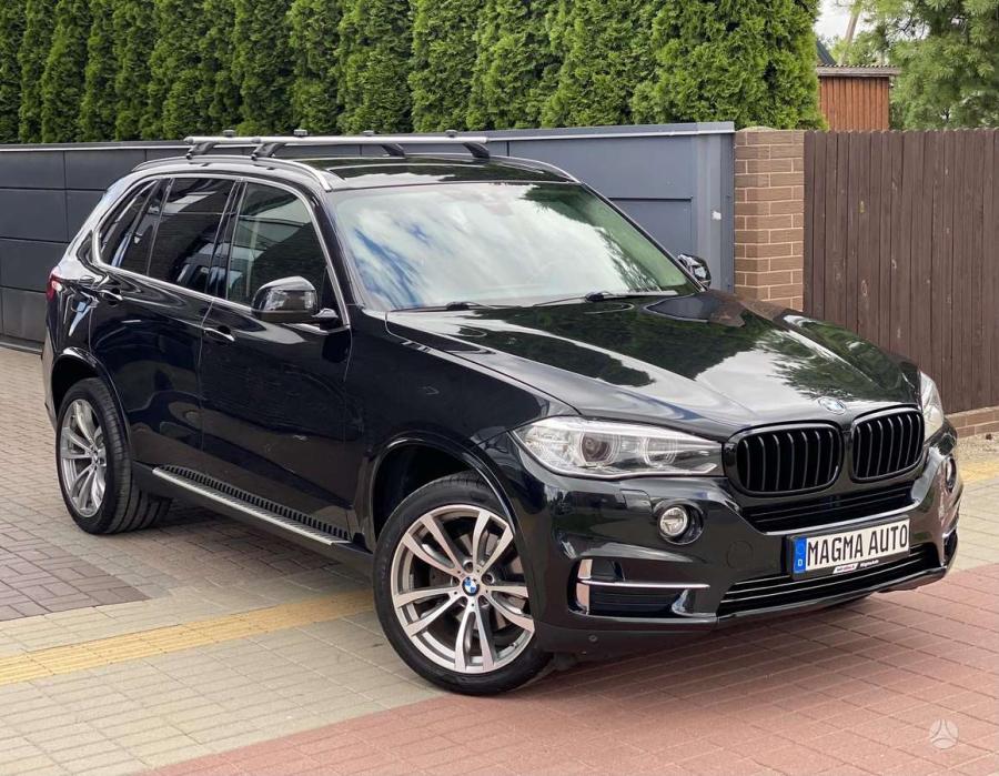 Black BMW X5 2014 in Marijampole, with an engine capacity of 2.99 L and mileage of 215 thousand km for 16850 €, photo 11 on AUTOMOTO.COM.LV