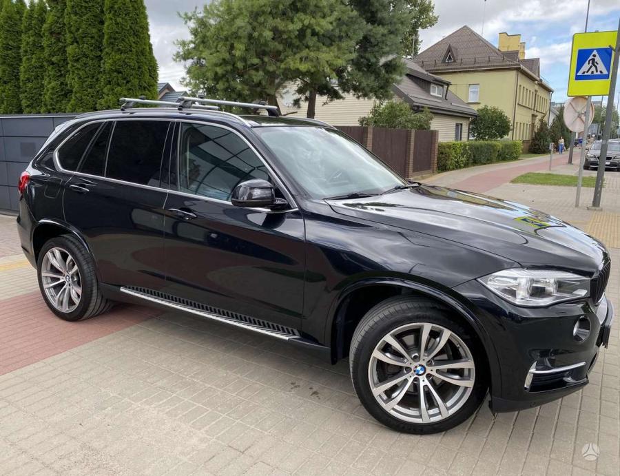Black BMW X5 2014 in Marijampole, with an engine capacity of 2.99 L and mileage of 215 thousand km for 16850 €, photo 12 on AUTOMOTO.COM.LV