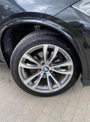Black BMW X5 2014 in Marijampole, with an engine capacity of 2.99 L and mileage of 215 thousand km for 16850 €, photo 13 on AUTOMOTO.COM.LV