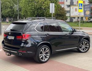 Black BMW X5 2014 in Marijampole, with an engine capacity of 2.99 L and mileage of 215 thousand km for 16850 €, photo 14 on AUTOMOTO.COM.LV