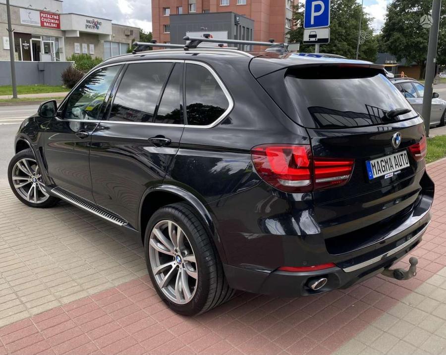 Black BMW X5 2014 in Marijampole, with an engine capacity of 2.99 L and mileage of 215 thousand km for 16850 €, photo 16 on AUTOMOTO.COM.LV