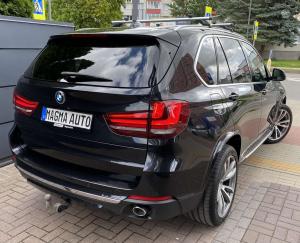 Black BMW X5 2014 in Marijampole, with an engine capacity of 2.99 L and mileage of 215 thousand km for 16850 €, photo 17 on AUTOMOTO.COM.LV