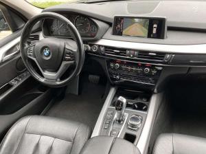 Black BMW X5 2014 in Marijampole, with an engine capacity of 2.99 L and mileage of 215 thousand km for 16850 €, photo 23 on AUTOMOTO.COM.LV