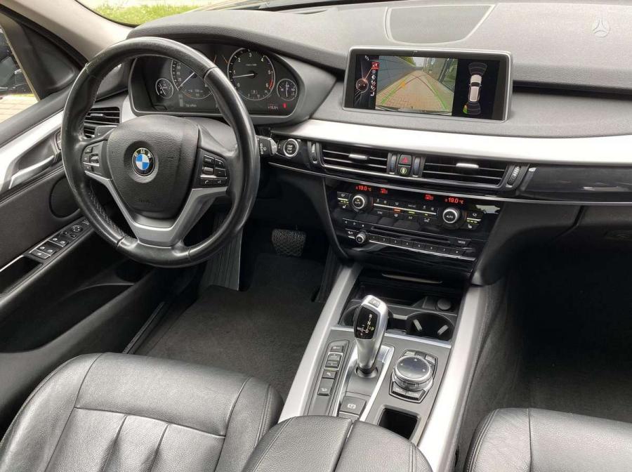 Black BMW X5 2014 in Marijampole, with an engine capacity of 2.99 L and mileage of 215 thousand km for 16850 €, photo 23 on AUTOMOTO.COM.LV