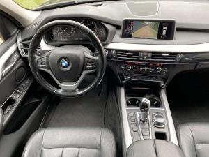 Black BMW X5 2014 in Marijampole, with an engine capacity of 2.99 L and mileage of 215 thousand km for 16850 €, photo 25 on AUTOMOTO.COM.LV