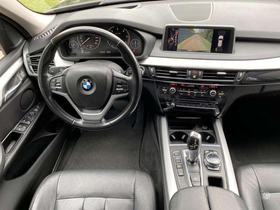 Black BMW X5 2014 in Marijampole, with an engine capacity of 2.99 L and mileage of 215 thousand km for 16850 €, photo 25 on AUTOMOTO.COM.LV