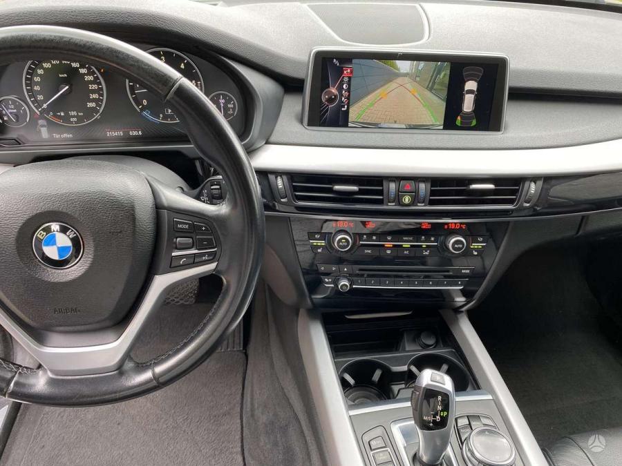 Black BMW X5 2014 in Marijampole, with an engine capacity of 2.99 L and mileage of 215 thousand km for 16850 €, photo 27 on AUTOMOTO.COM.LV