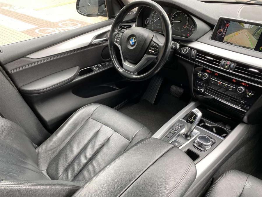 Black BMW X5 2014 in Marijampole, with an engine capacity of 2.99 L and mileage of 215 thousand km for 16850 €, photo 37 on AUTOMOTO.COM.LV