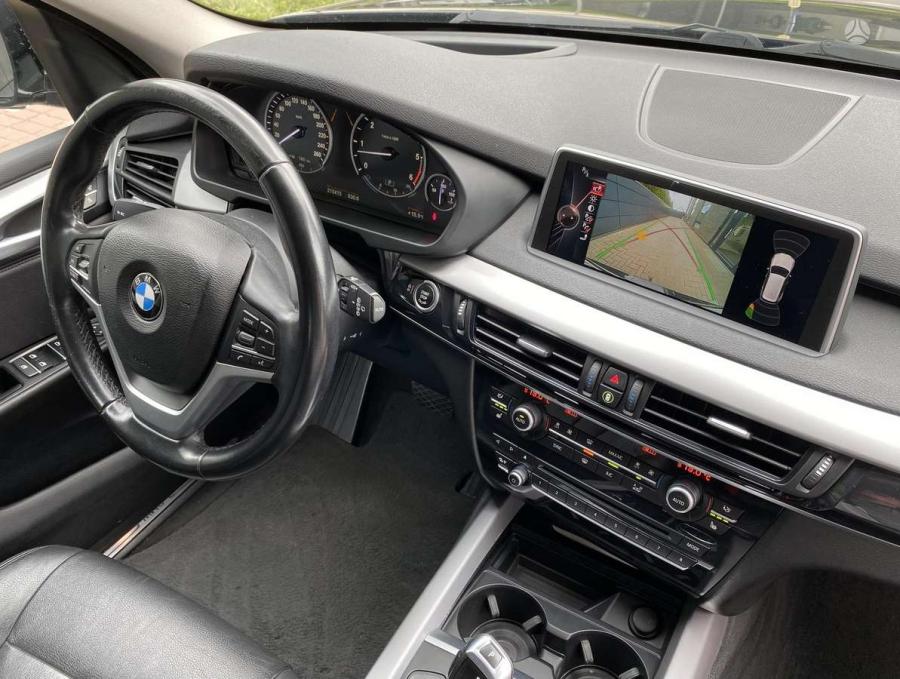 Black BMW X5 2014 in Marijampole, with an engine capacity of 2.99 L and mileage of 215 thousand km for 16850 €, photo 38 on AUTOMOTO.COM.LV