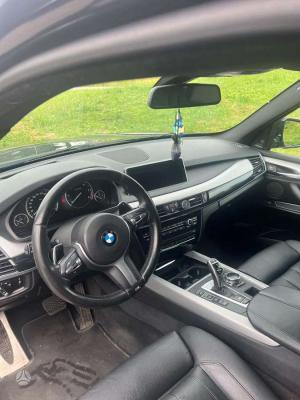 Black BMW X5 2014 in Kaunas, with an engine capacity of 3.00 L and mileage of 260 thousand km for 19599 €, photo 6 on AUTOMOTO.COM.LV
