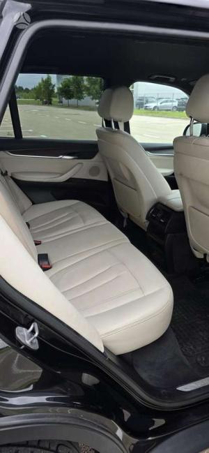 Black BMW X5 2014 in Panevezys, with an engine capacity of 2.00 L and mileage of 248 thousand km for 16000 €, photo 7 on AUTOMOTO.COM.LV
