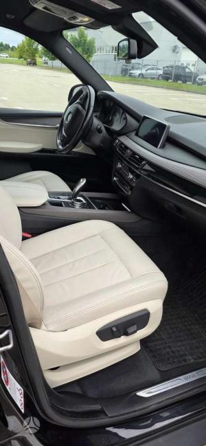 Black BMW X5 2014 in Panevezys, with an engine capacity of 2.00 L and mileage of 248 thousand km for 16000 €, photo 8 on AUTOMOTO.COM.LV