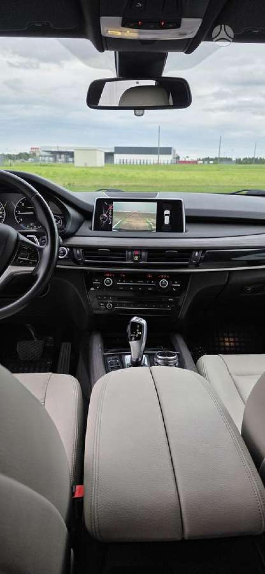 Black BMW X5 2014 in Panevezys, with an engine capacity of 2.00 L and mileage of 248 thousand km for 16000 €, photo 12 on AUTOMOTO.COM.LV
