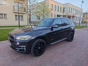 Black BMW X5 2014 in Plunge, with an engine capacity of 3.00 L and mileage of 285 thousand km for 16800 €, photo  on AUTOMOTO.COM.LV