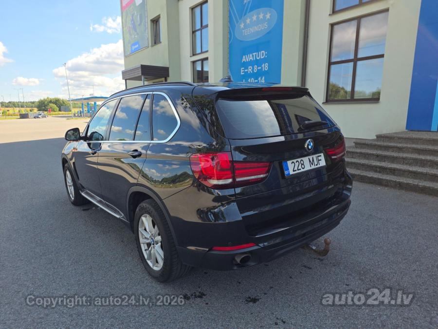 Black BMW X5 2014 in Tallinn, with an engine capacity of 3.00 L and mileage of 433 thousand km for 13640 €, photo 5 on AUTOMOTO.COM.LV
