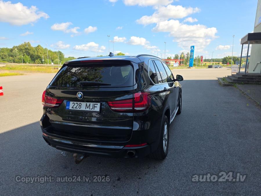 Black BMW X5 2014 in Tallinn, with an engine capacity of 3.00 L and mileage of 433 thousand km for 13640 €, photo 6 on AUTOMOTO.COM.LV