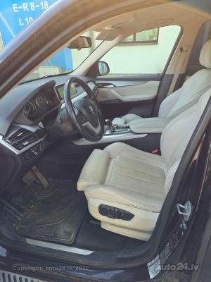 Black BMW X5 2014 in Tallinn, with an engine capacity of 3.00 L and mileage of 433 thousand km for 13640 €, photo 7 on AUTOMOTO.COM.LV