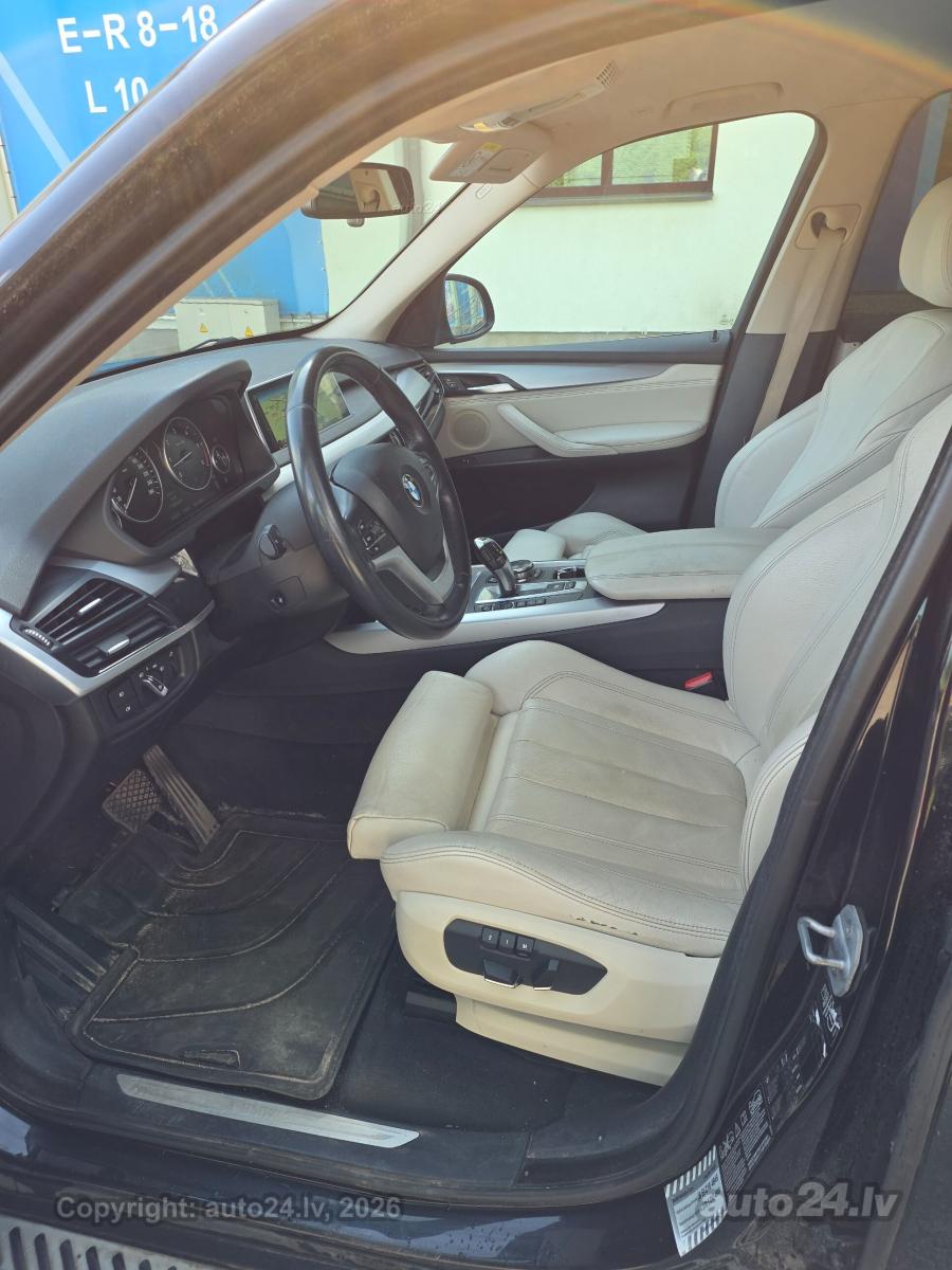 Black BMW X5 2014 in Tallinn, with an engine capacity of 3.00 L and mileage of 433 thousand km for 13640 €, photo 7 on AUTOMOTO.COM.LV