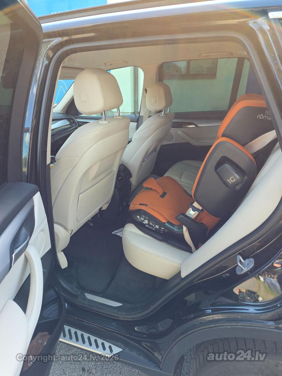 Black BMW X5 2014 in Tallinn, with an engine capacity of 3.00 L and mileage of 433 thousand km for 13640 €, photo 8 on AUTOMOTO.COM.LV
