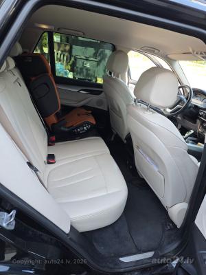 Black BMW X5 2014 in Tallinn, with an engine capacity of 3.00 L and mileage of 433 thousand km for 13640 €, photo 9 on AUTOMOTO.COM.LV