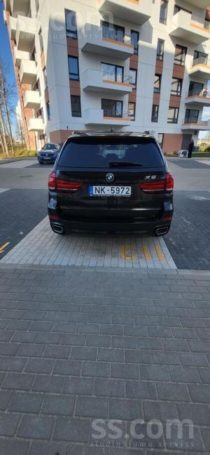 Black BMW X5 2014 in Riga, with an engine capacity of 3.00 L and mileage of 232 thousand km for 23000 €, photo 4 on AUTOMOTO.COM.LV