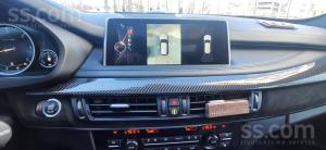 Black BMW X5 2014 in Riga, with an engine capacity of 3.00 L and mileage of 232 thousand km for 23000 €, photo 9 on AUTOMOTO.COM.LV
