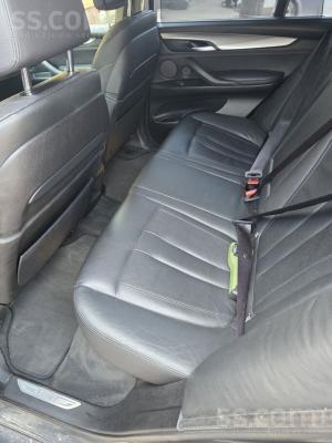 Black BMW X5 2014 in Valmiera, with an engine capacity of 3.00 L and mileage of 235 thousand km for 22400 €, photo 13 on AUTOMOTO.COM.LV
