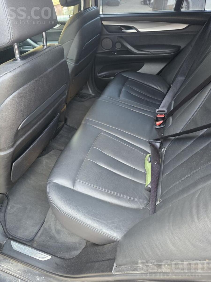 Black BMW X5 2014 in Valmiera, with an engine capacity of 3.00 L and mileage of 235 thousand km for 22400 €, photo 13 on AUTOMOTO.COM.LV