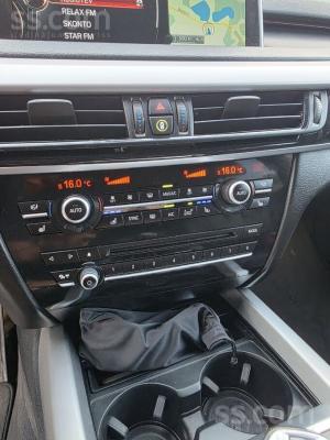 Black BMW X5 2014 in Valmiera, with an engine capacity of 3.00 L and mileage of 235 thousand km for 22400 €, photo 16 on AUTOMOTO.COM.LV