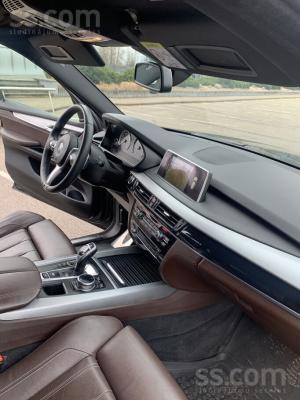 Black BMW X5 2014 in Riga, with an engine capacity of 2.00 L and mileage of 370 thousand km for 15900 €, photo 6 on AUTOMOTO.COM.LV