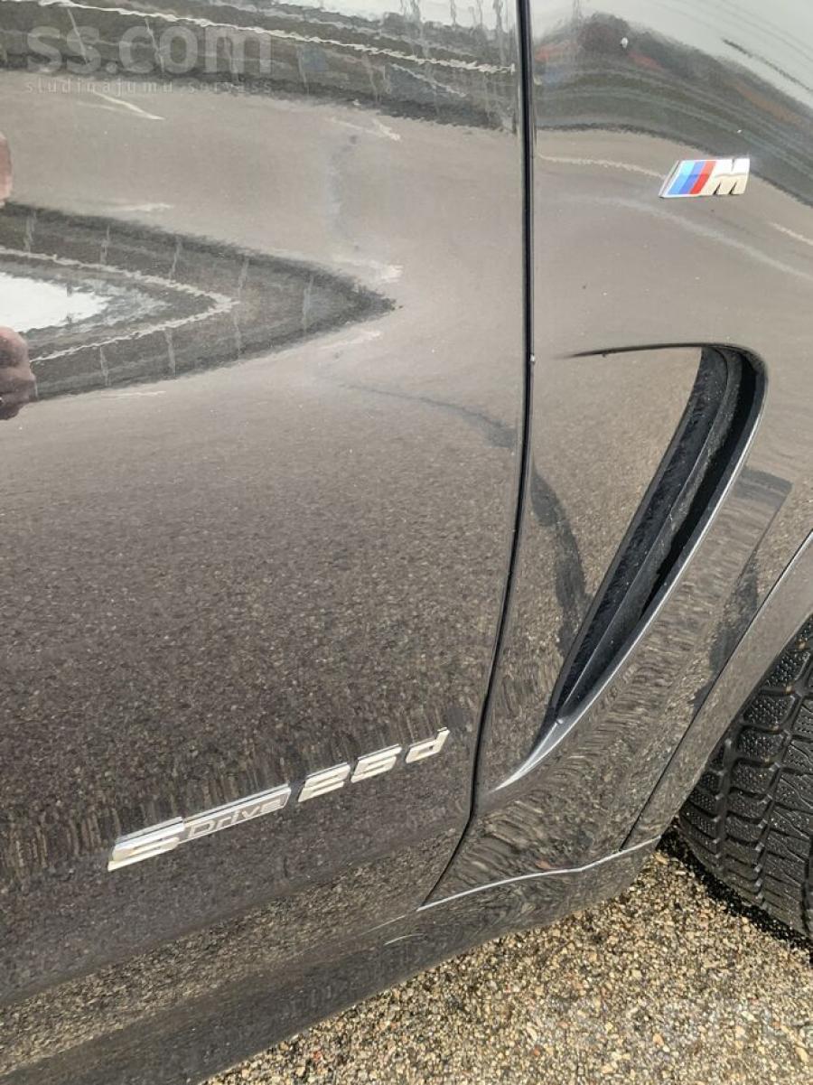 Black BMW X5 2014 in Riga, with an engine capacity of 2.00 L and mileage of 370 thousand km for 15900 €, photo 7 on AUTOMOTO.COM.LV