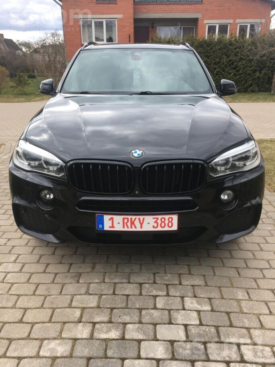 Black BMW X5 2014 in Riga, with an engine capacity of 2.00 L and mileage of 370 thousand km for 15900 €, photo 8 on AUTOMOTO.COM.LV