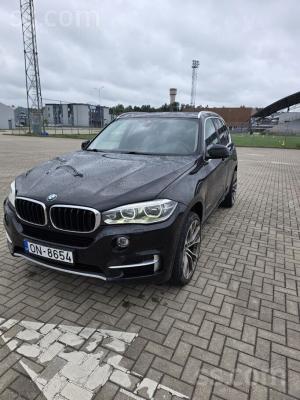 Black BMW X5 2014 in Valmiera, with an engine capacity of 3.00 L and mileage of 235 thousand km for 20600 €, photo 13 on AUTOMOTO.COM.LV