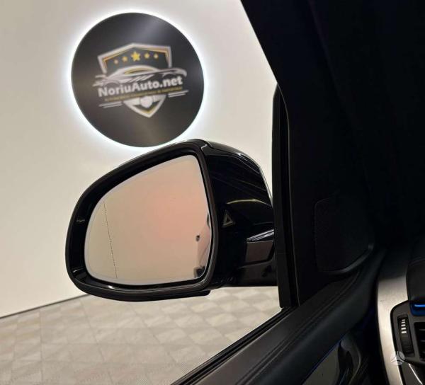 Black BMW X5 2014 in Marijampole, with an engine capacity of 2.99 L and mileage of 213 thousand km for 19450 €, photo 5 on AUTOMOTO.COM.LV