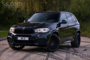 Black BMW X5 2014 in Riga, with an engine capacity of 3.00 L and mileage of 260 thousand km for 23100 €, photo 4 on AUTOMOTO.COM.LV