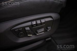 Black BMW X5 2014 in Riga, with an engine capacity of 3.00 L and mileage of 260 thousand km for 23100 €, photo 14 on AUTOMOTO.COM.LV