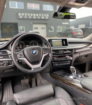 Black BMW X5 2014 in Tallinn, with an engine capacity of 3.00 L and mileage of 0 thousand km for 27000 €, photo 5 on AUTOMOTO.COM.LV