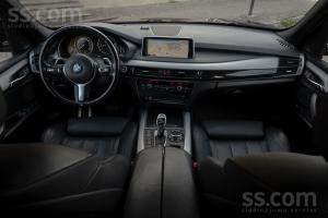 Black BMW X5 2014 in Jelgava, with an engine capacity of 3.00 L and mileage of 302 thousand km for 20450 €, photo 6 on AUTOMOTO.COM.LV