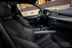 Black BMW X5 2014 in Jelgava, with an engine capacity of 3.00 L and mileage of 302 thousand km for 20450 €, photo 21 on AUTOMOTO.COM.LV