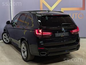 Black BMW X5 2014 in Jurmala, with an engine capacity of 3.00 L and mileage of 263 thousand km for 22950 €, photo 7 on AUTOMOTO.COM.LV