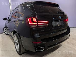 Black BMW X5 2014 in Jurmala, with an engine capacity of 3.00 L and mileage of 263 thousand km for 22950 €, photo 8 on AUTOMOTO.COM.LV
