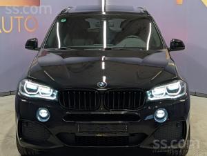 Black BMW X5 2014 in Jurmala, with an engine capacity of 3.00 L and mileage of 263 thousand km for 22950 €, photo 12 on AUTOMOTO.COM.LV