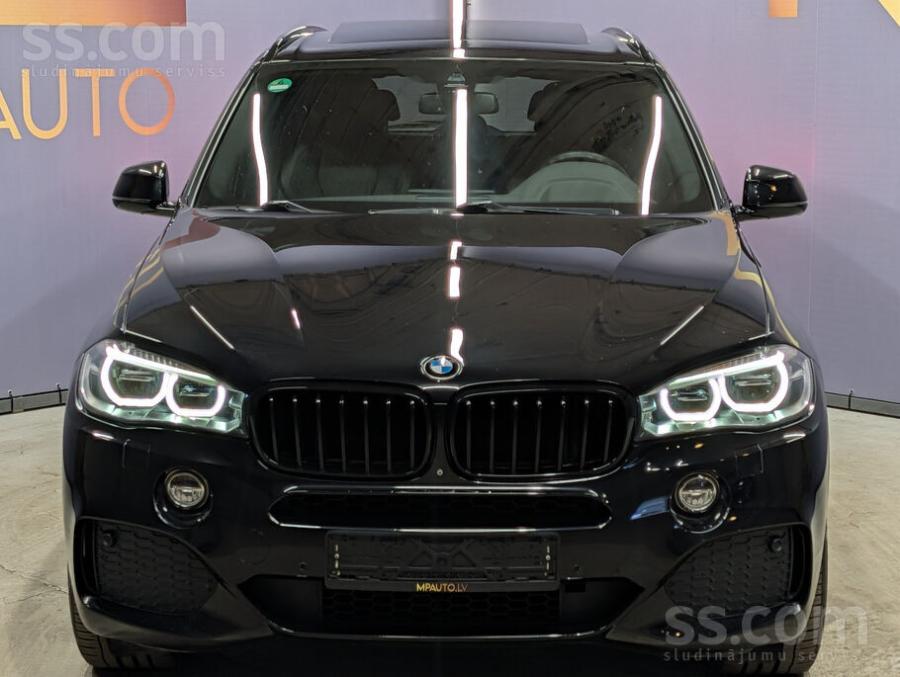 Black BMW X5 2014 in Jurmala, with an engine capacity of 3.00 L and mileage of 263 thousand km for 22950 €, photo 13 on AUTOMOTO.COM.LV