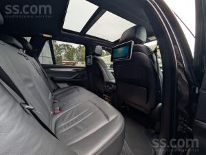 Black BMW X5 2014 in Jurmala, with an engine capacity of 3.00 L and mileage of 263 thousand km for 22950 €, photo 19 on AUTOMOTO.COM.LV