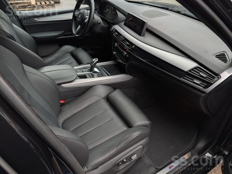 Black BMW X5 2014 in Jurmala, with an engine capacity of 3.00 L and mileage of 263 thousand km for 22950 €, photo 20 on AUTOMOTO.COM.LV