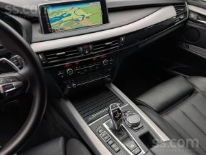 Black BMW X5 2014 in Jurmala, with an engine capacity of 3.00 L and mileage of 263 thousand km for 22950 €, photo 25 on AUTOMOTO.COM.LV