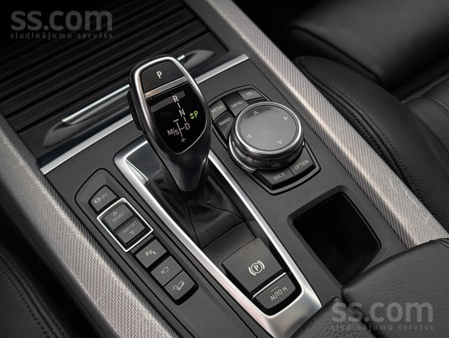 Black BMW X5 2014 in Jurmala, with an engine capacity of 3.00 L and mileage of 263 thousand km for 22950 €, photo 26 on AUTOMOTO.COM.LV