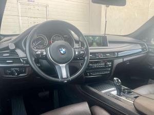 Black BMW X5 2014 in Kaunas, with an engine capacity of 2.00 L and mileage of 289 thousand km for 19999 €, photo 13 on AUTOMOTO.COM.LV